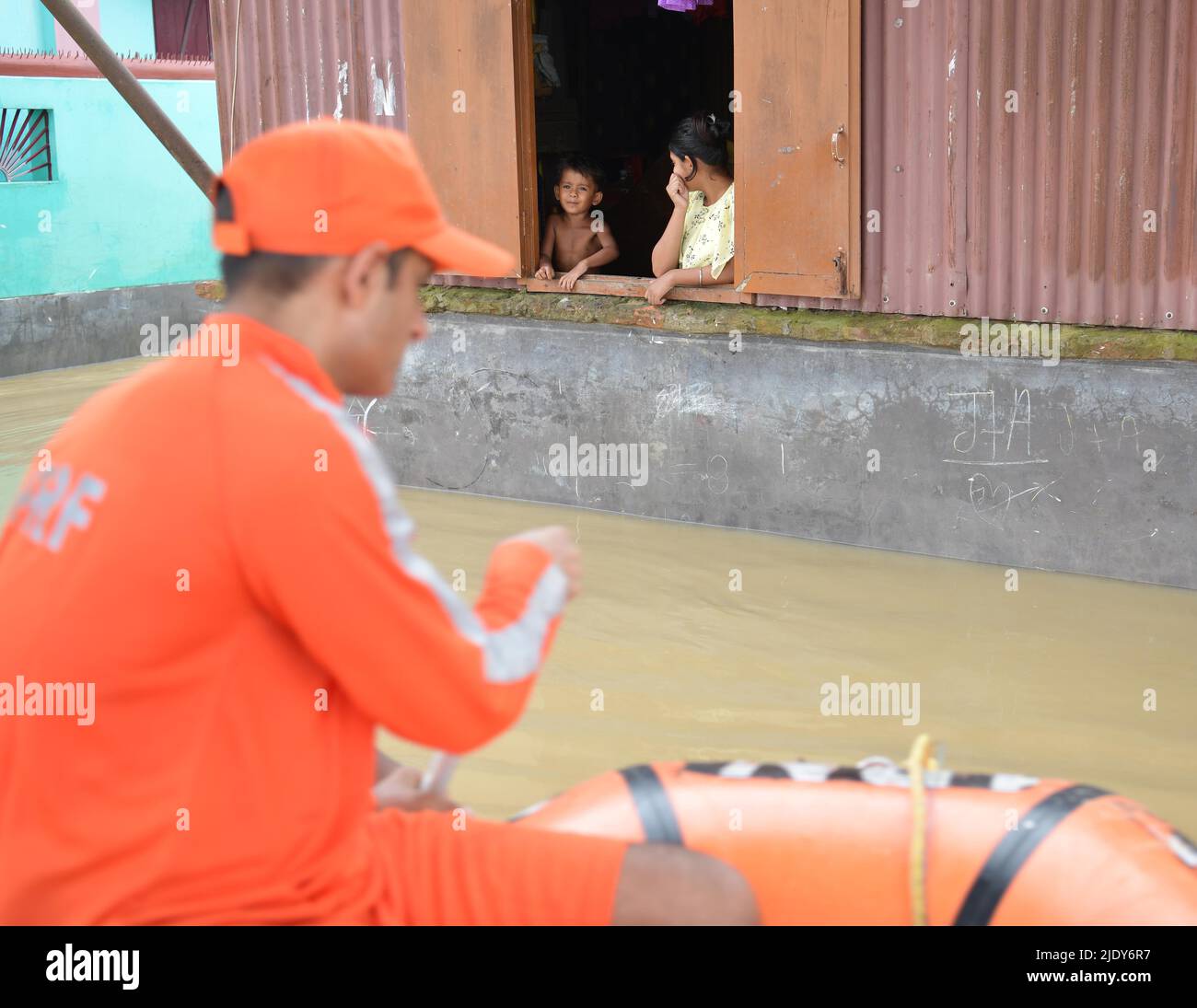 People are waiting at their homes to get rescued by the NDRF (National Disaster Response Force ...