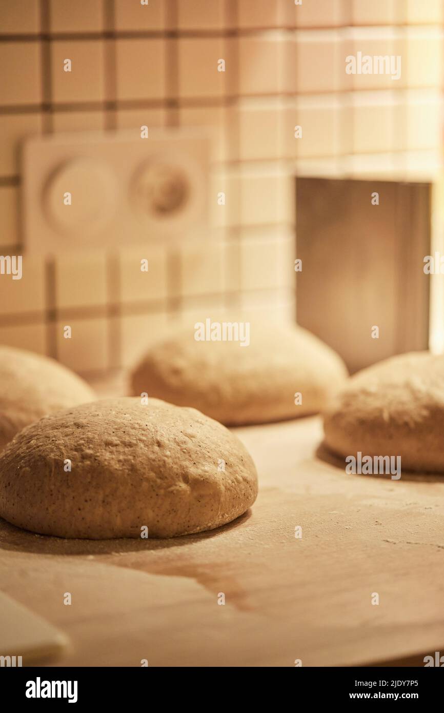 The process of making wheat bread at home. Dough shaping. The concept ...