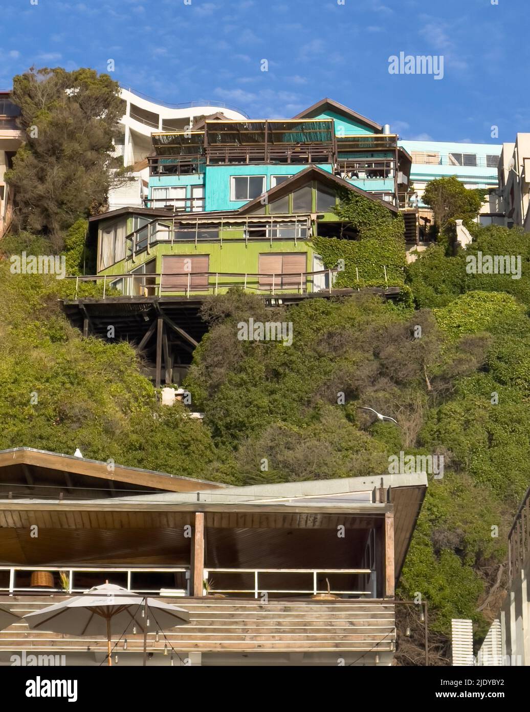 Traditional wooden town house on hillside by Reñaca coast. Building ...