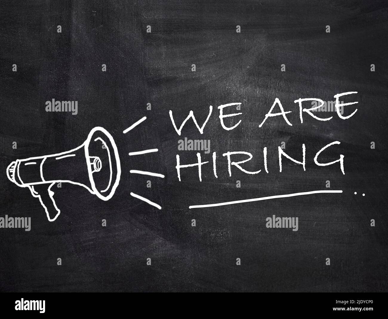 We are hiring text with megaphone on chalkboard background. Concept ...