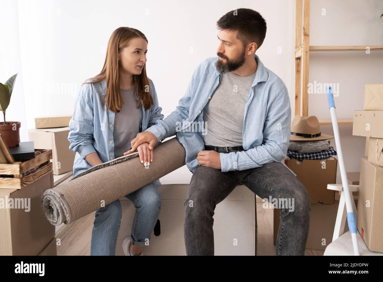 portrait of happy couple moving owners of new house, man and woman ...