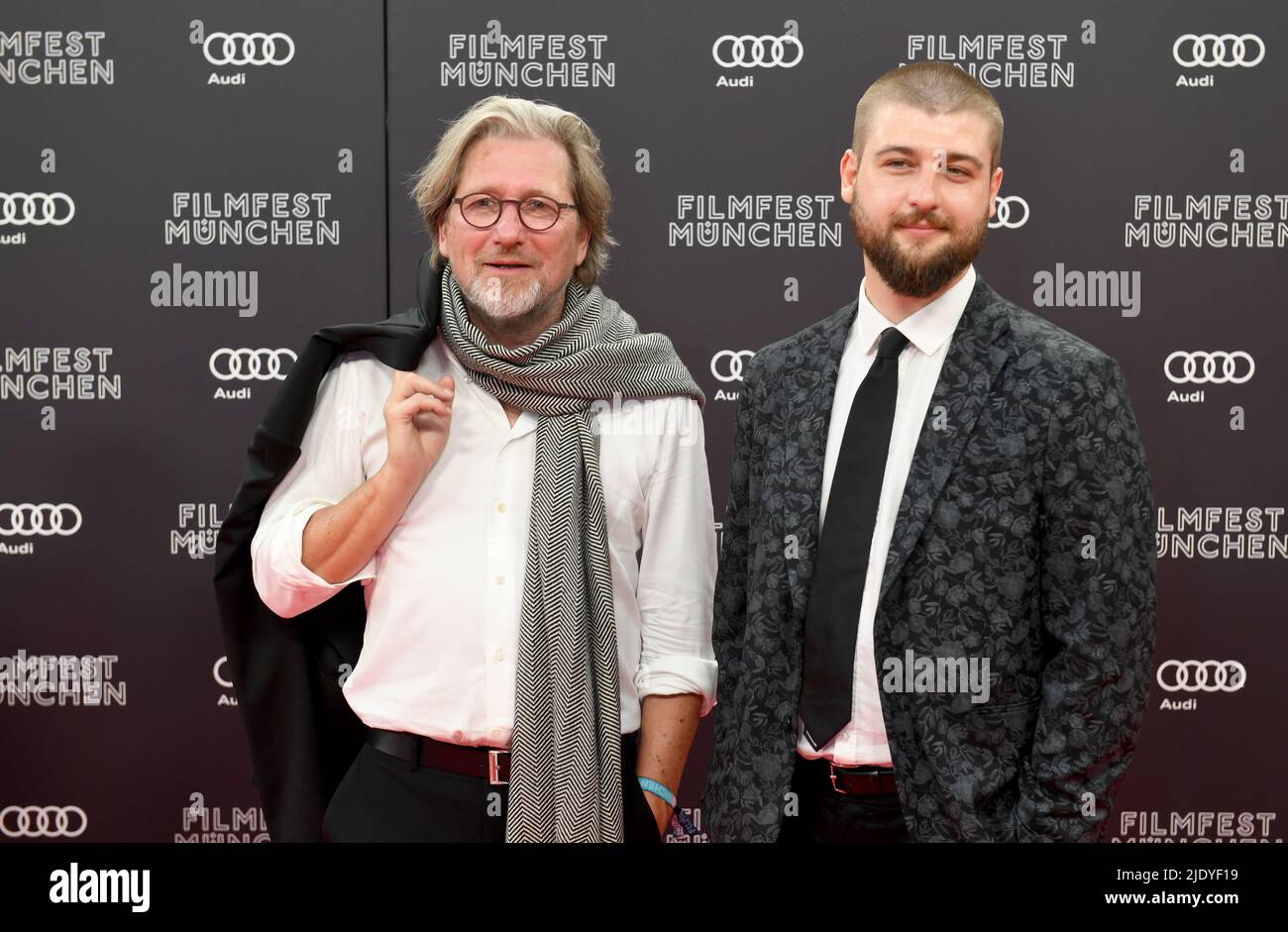Munich, Germany. 23rd June, 2022. Actor Michael Fitz and his son ...