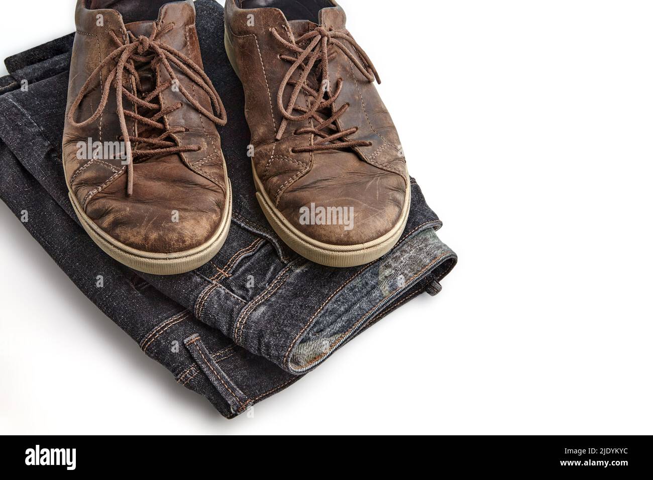 Stylishly distressed vintage brown leather shoes and black jeans ...