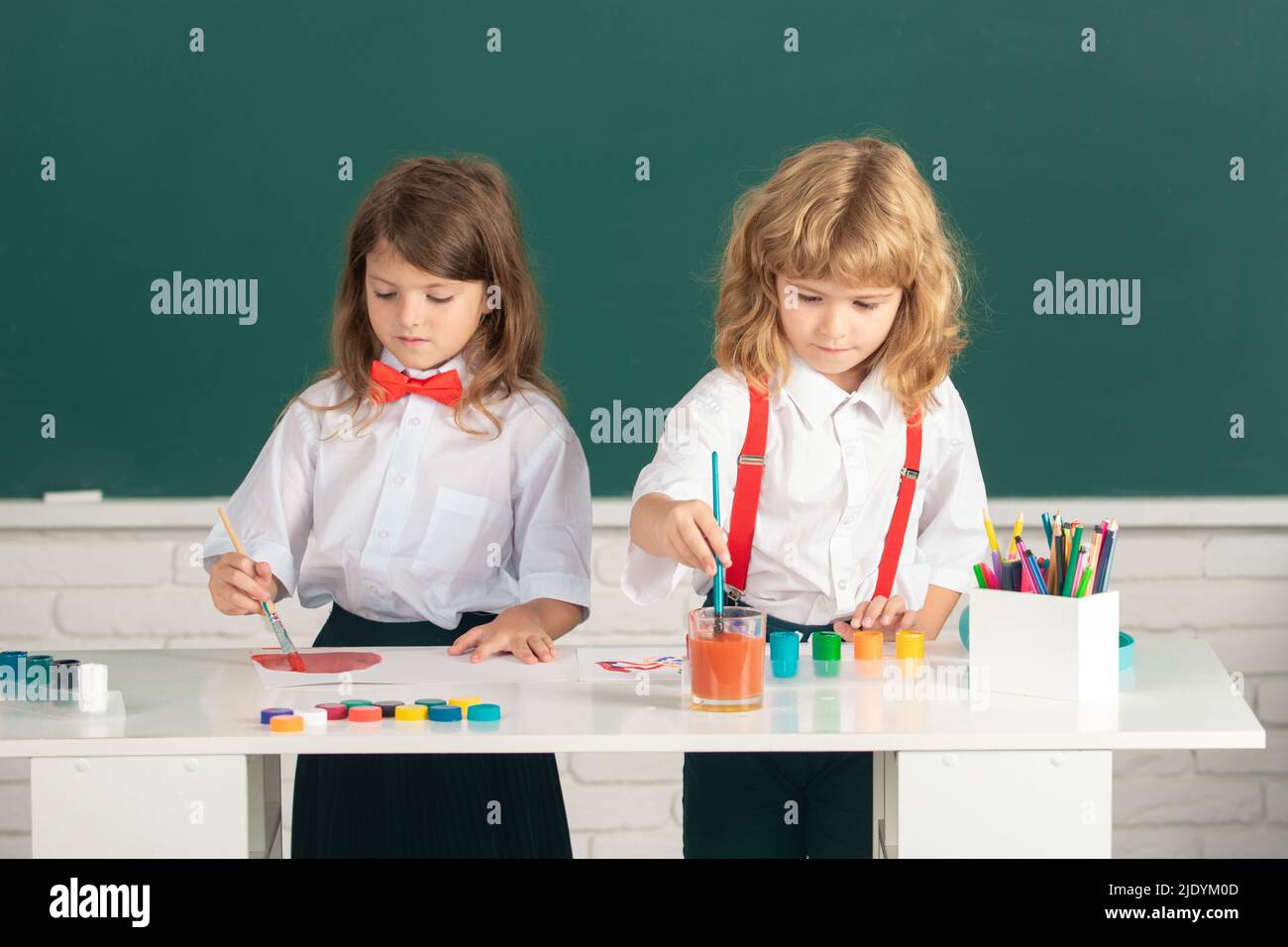 Kids creative growth. Cute school friends kids drawing and painting at ...