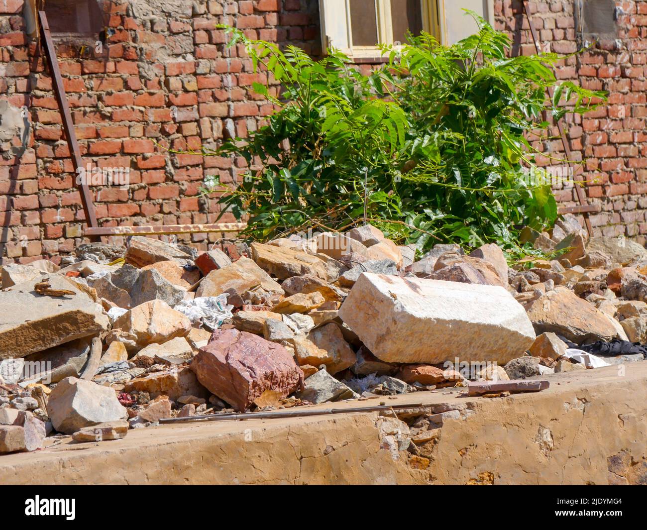 Ruin structure, debris scattered scene in rural village in India ...