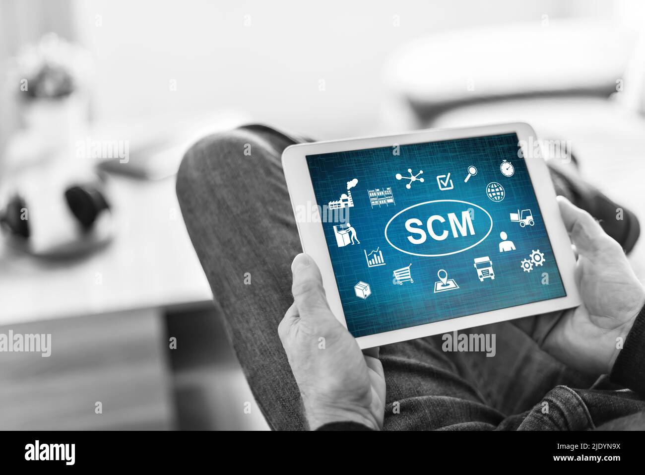 Tablet screen displaying a scm concept Stock Photo - Alamy