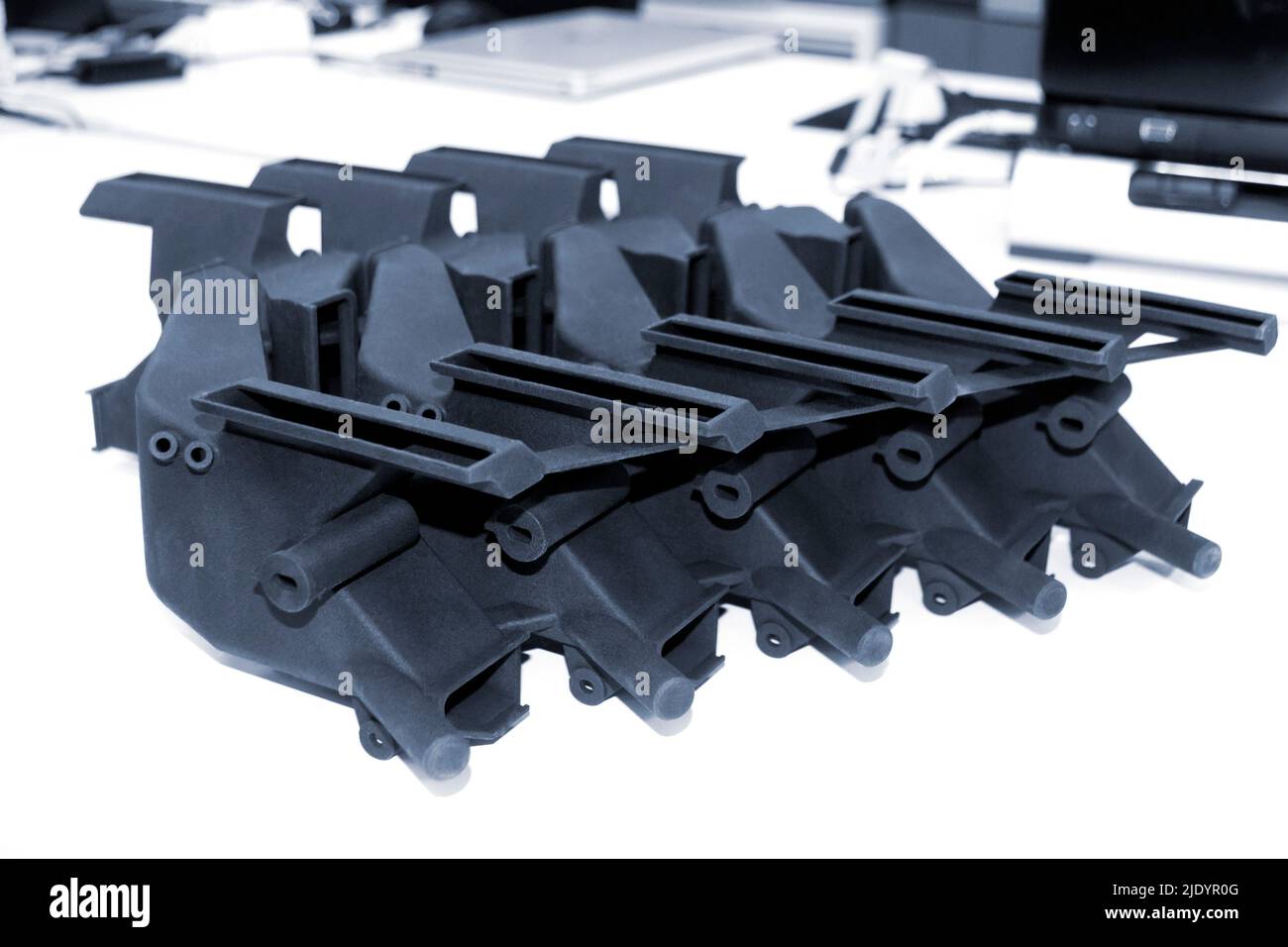 Models printed on 3D printer isolated on white background. Objects ...