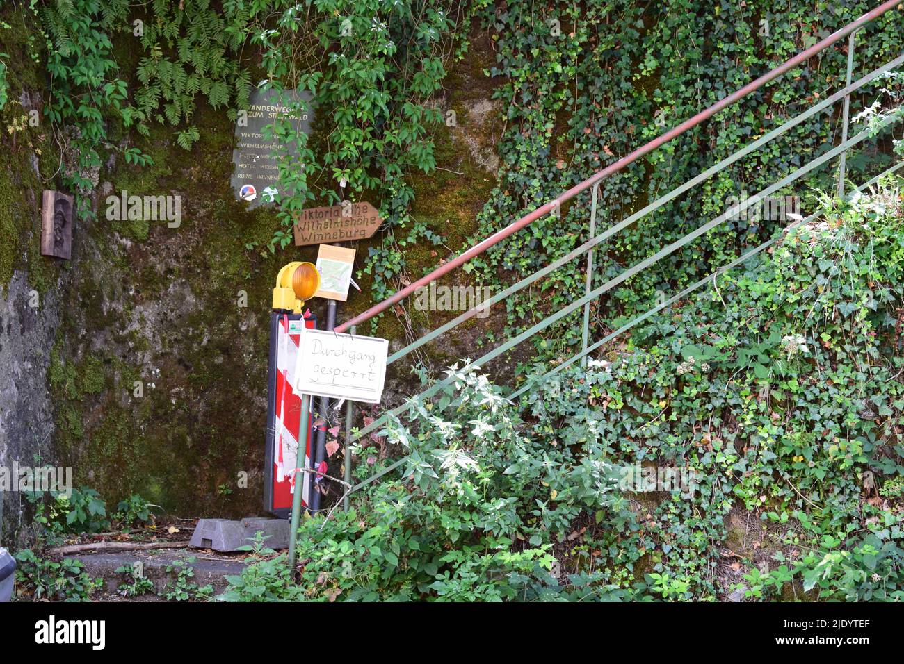 blocked way with many signs Stock Photo - Alamy