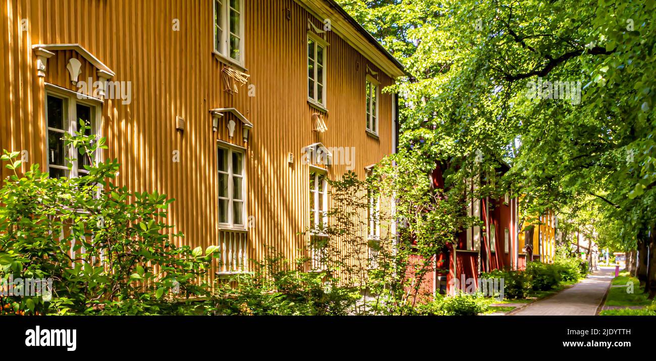 Wooden buildings in the Puu-Käpylä area of Helsinki, Finland in summer ...