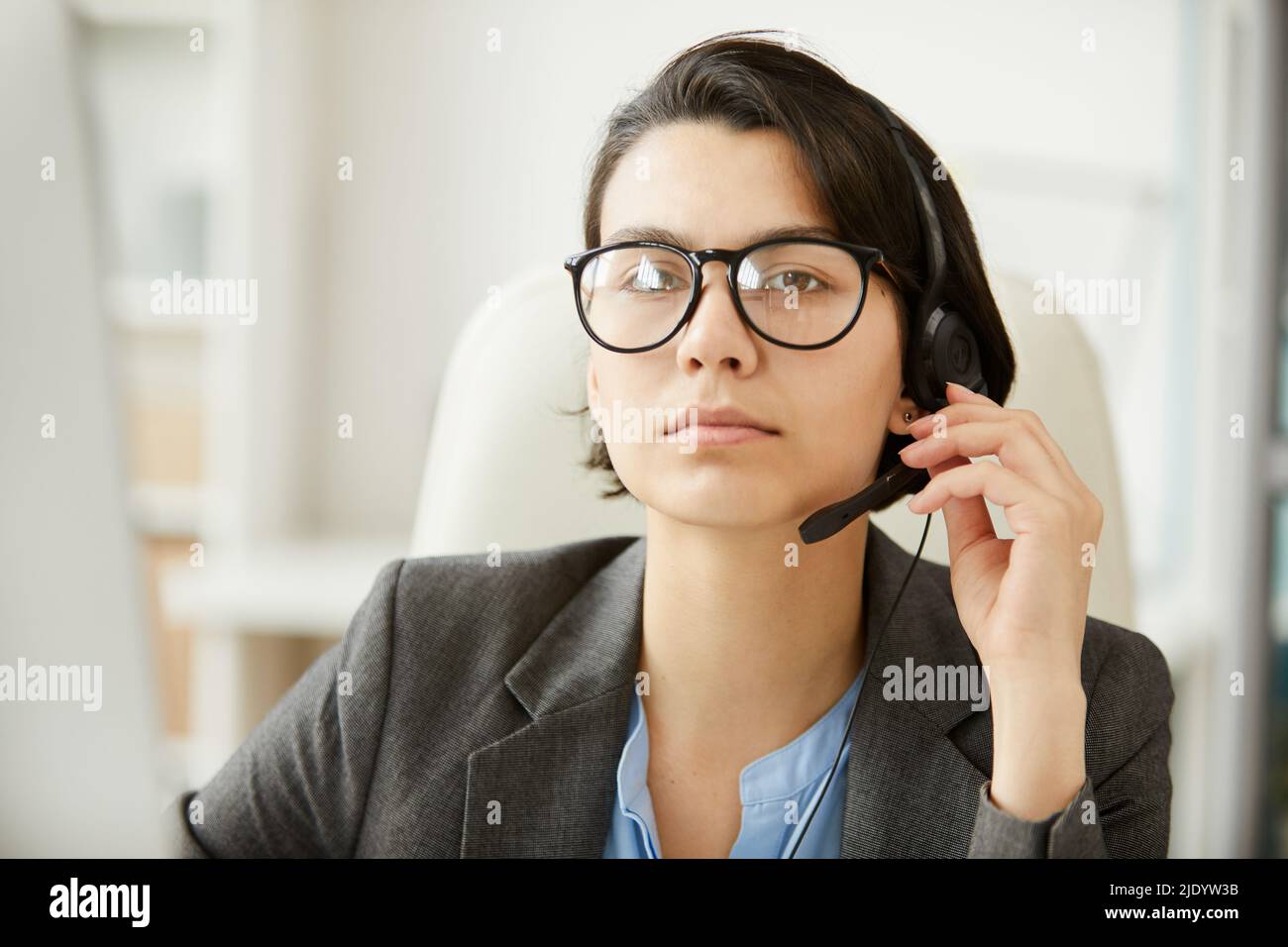 Female secretary wearing headset working hi-res stock photography and ...