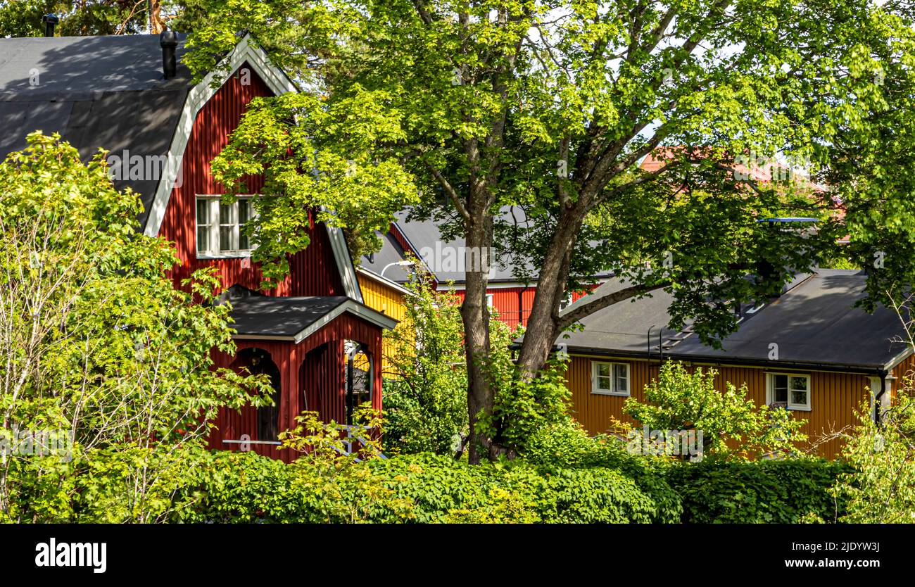 Wooden buildings in the Puu-Käpylä area of Helsinki, Finland in summer ...