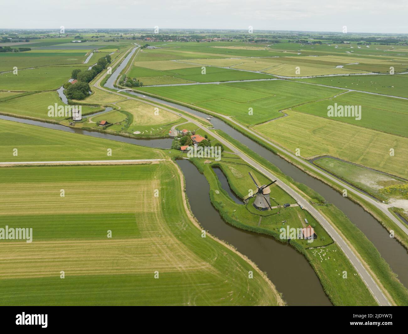 Historic traditional typical dutch old windmills mills on the rural ...