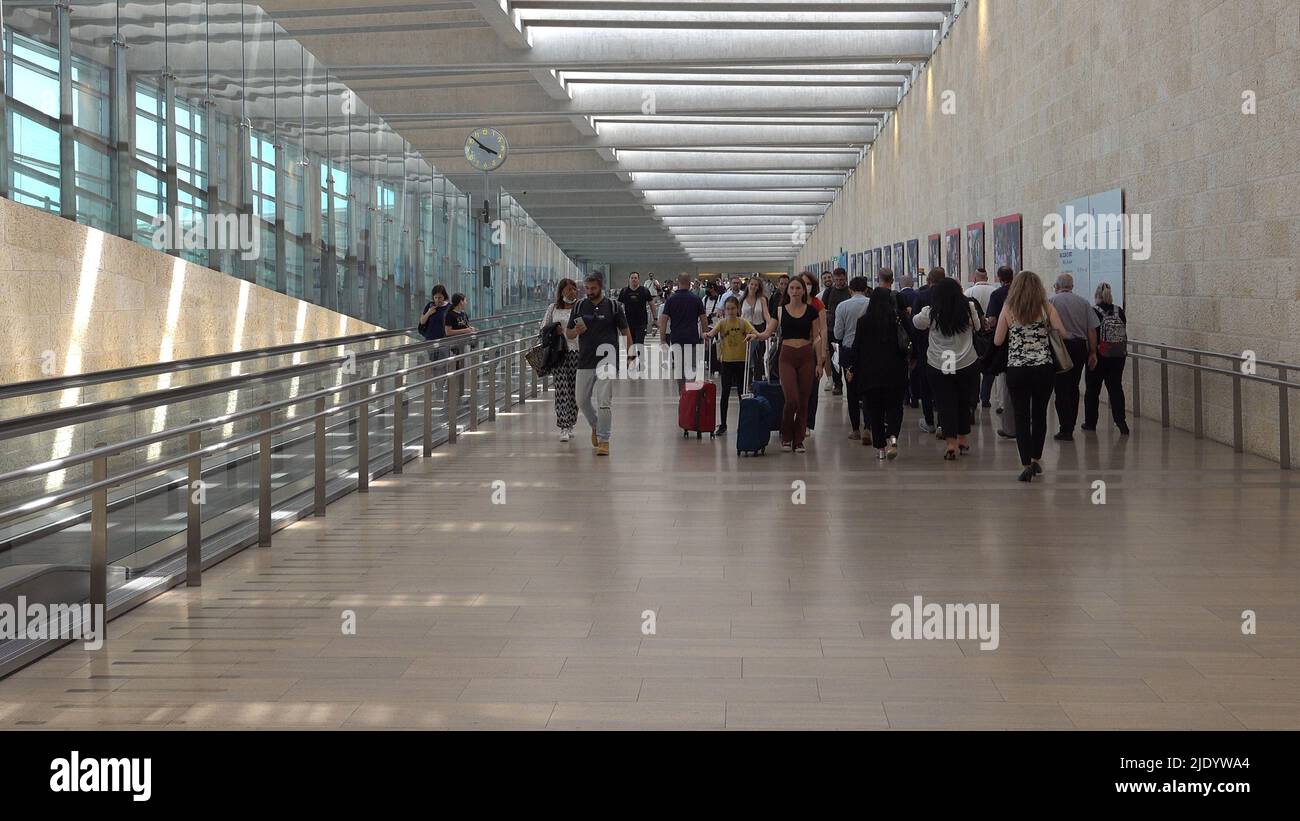 Passengers on their way to catch their flight inside terminal 3 of Ben ...