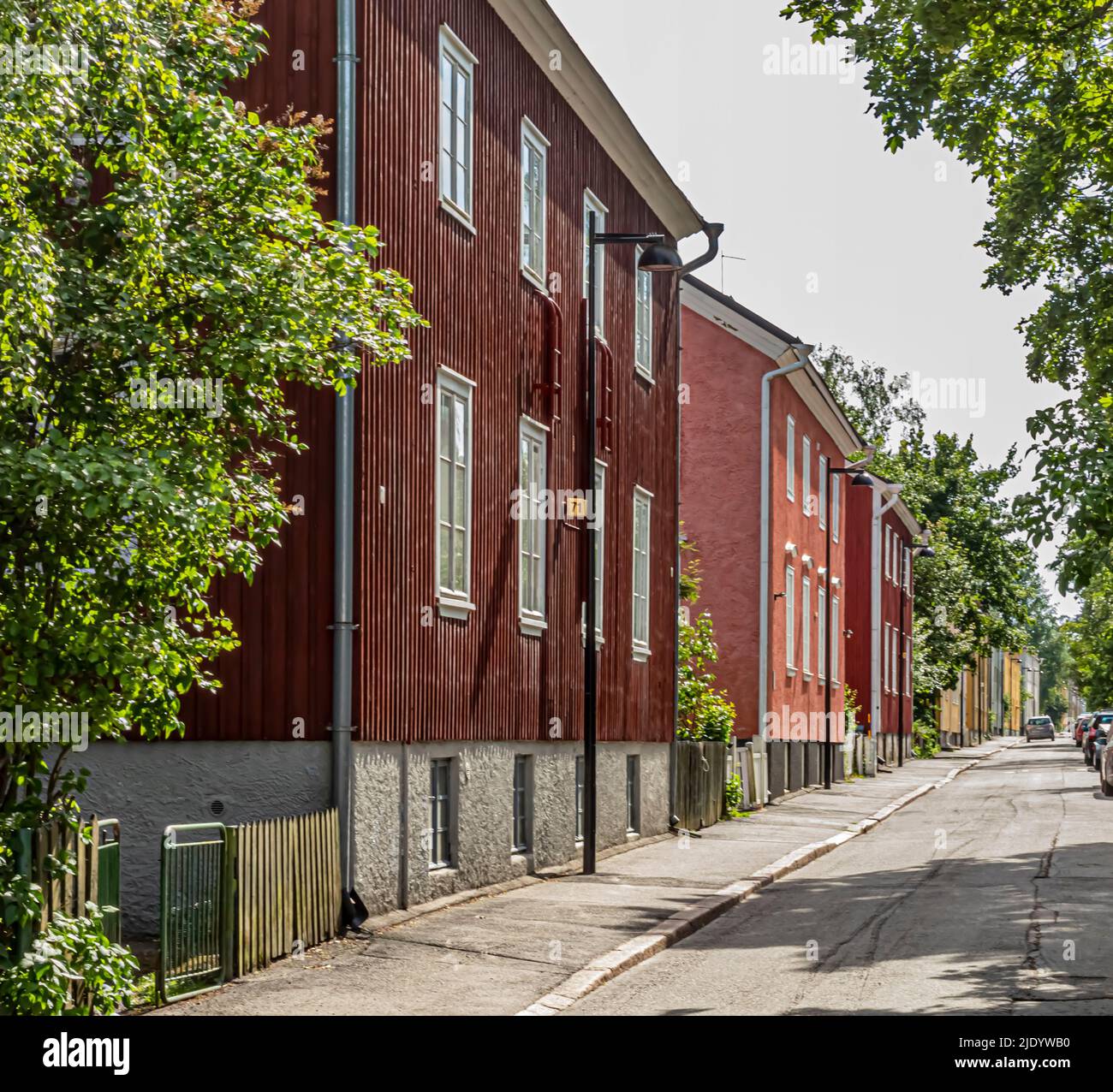Wooden buildings in the Kumpula area of Helsinki, Finland in summer ...
