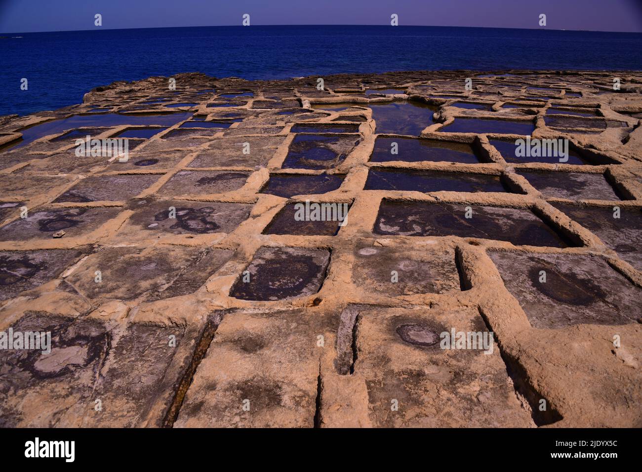 Dreamlike view of the maltese saltworks in Marsaskala, Malta Stock ...