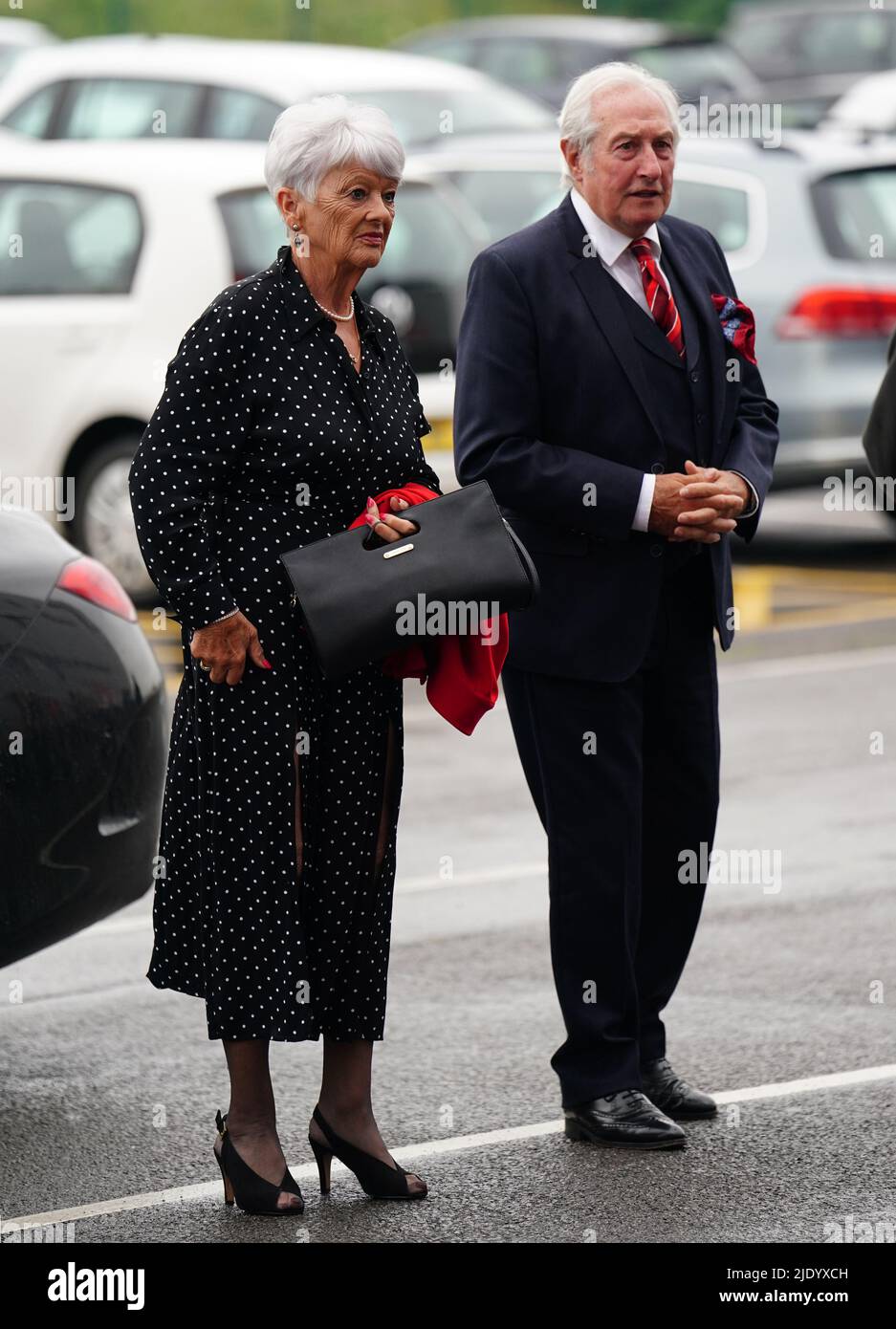 Sir Gareth Edwards arrives with his wife Maureen for the remembrance ...