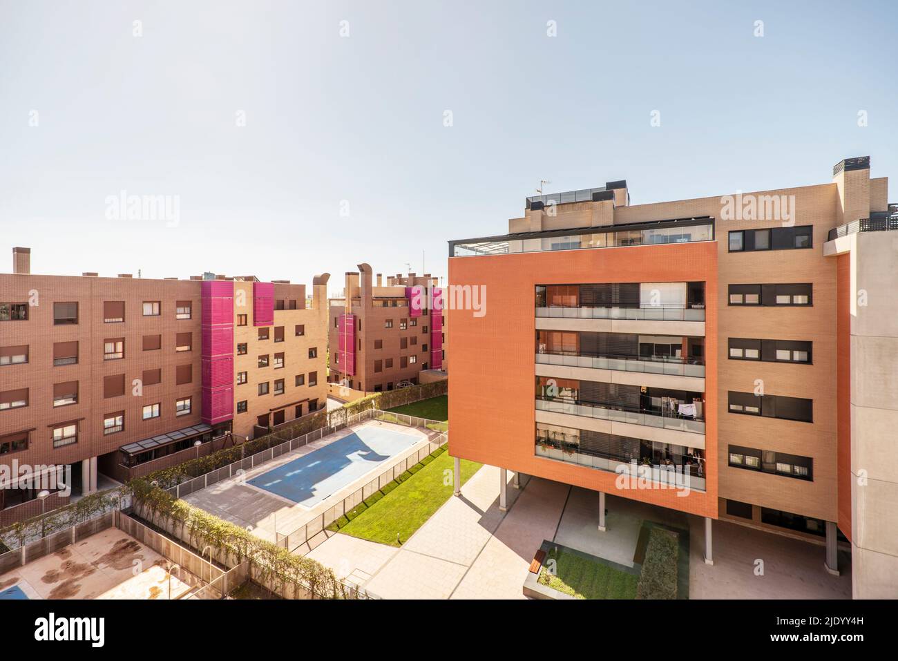 Interior facades of interior common areas with artificial grass floor ...