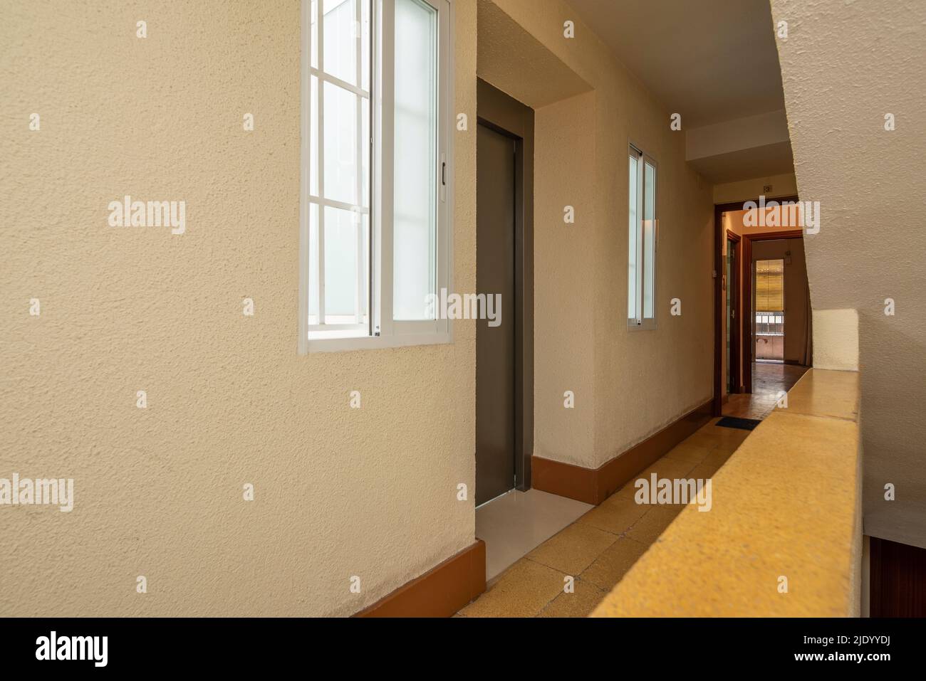hall section with elevator in an urban residential home Stock Photo - Alamy