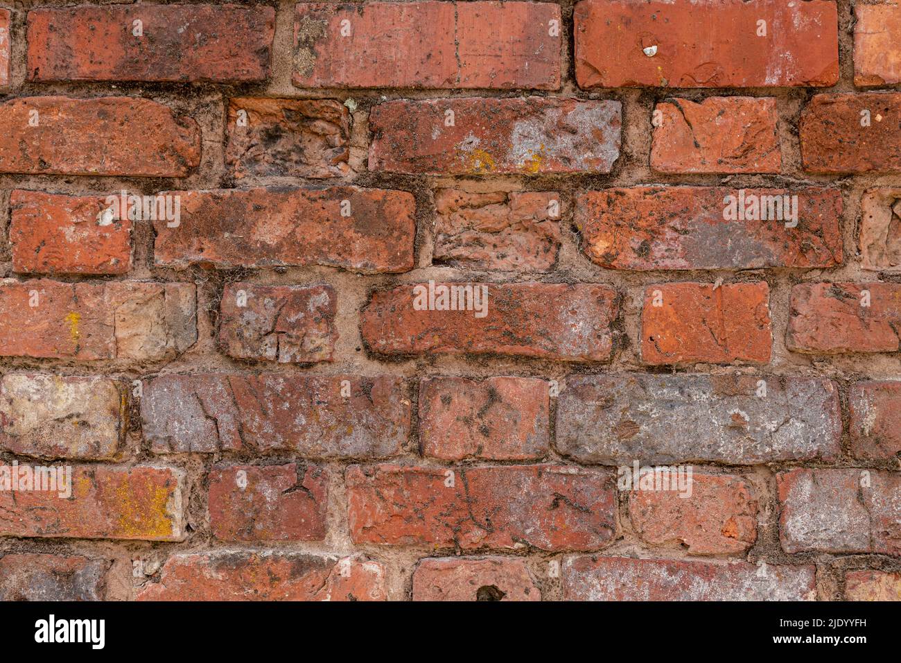 Wall made of old discoloured bricks Stock Photo - Alamy