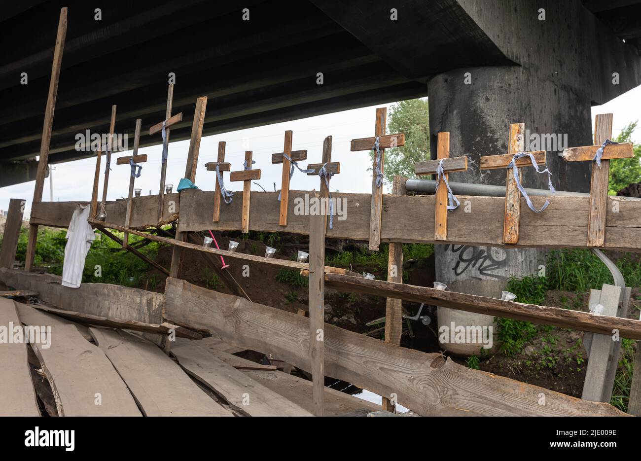 Crosses are attached to the destroyed Irpin bridge, Irpin town, Ukraine ...