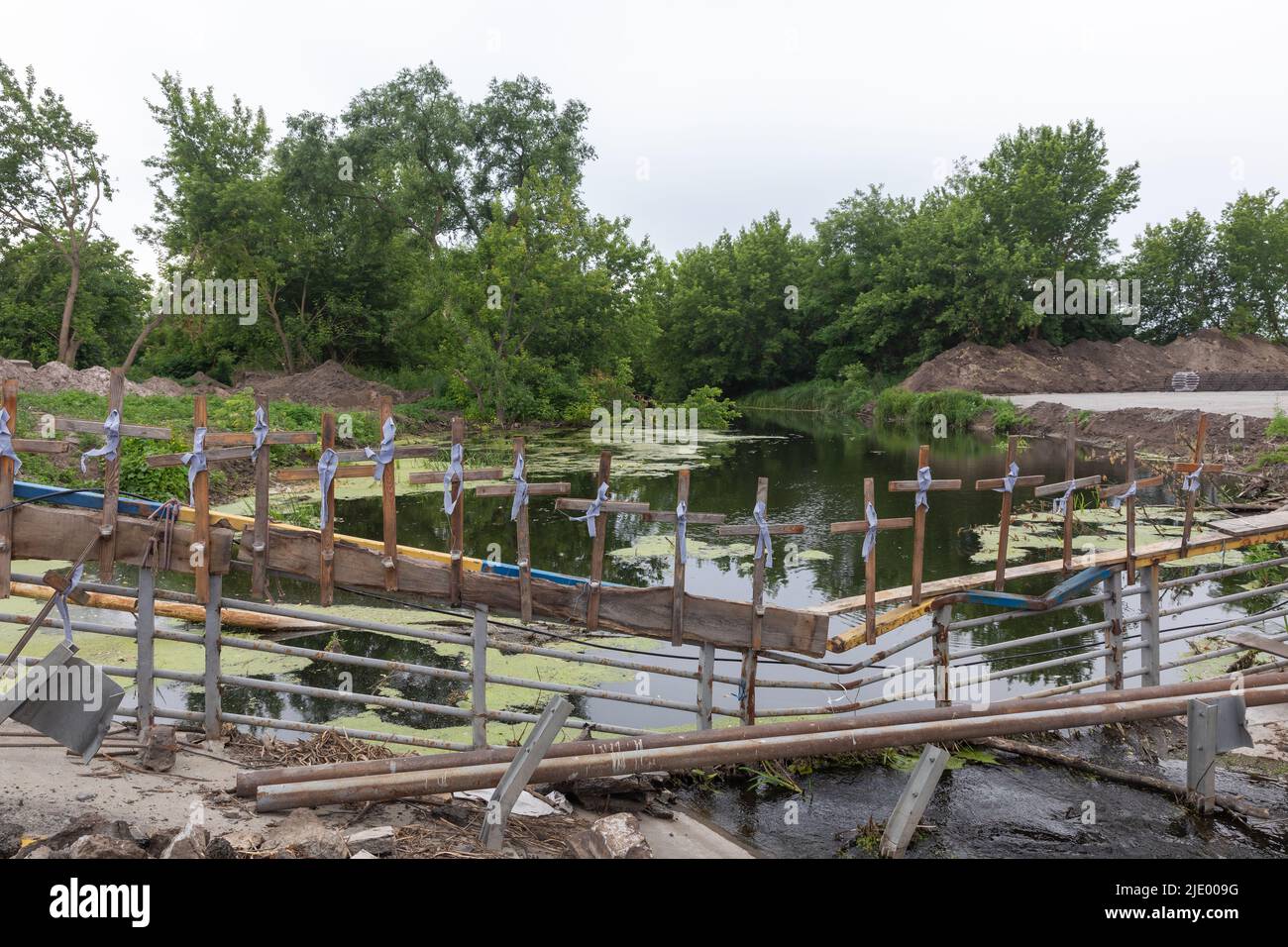 Crosses are attached to the destroyed Irpin bridge, Irpin town, Ukraine ...