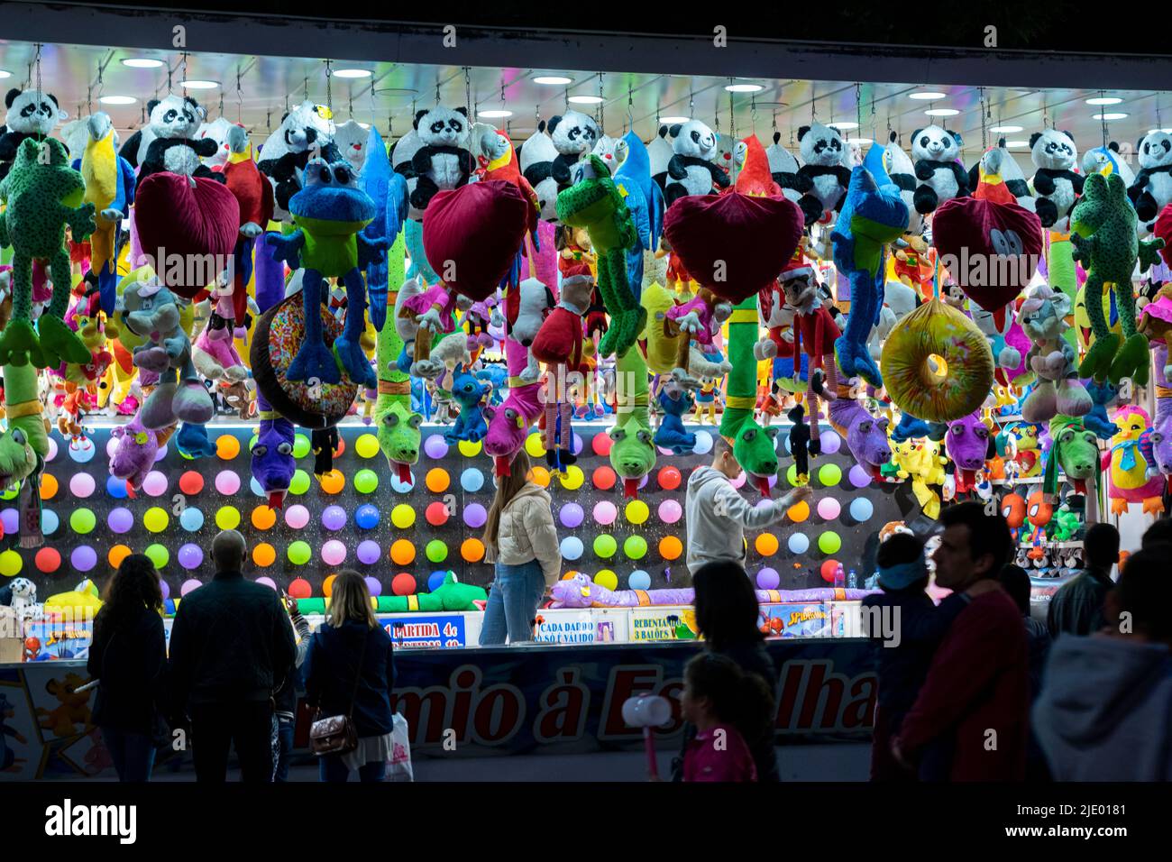 Festivals and fairs games to win toys and prizes aiming at balloons ...