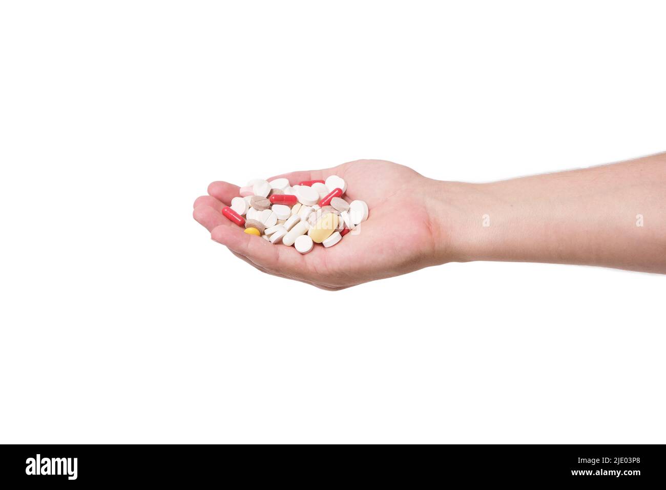Large number tablets your hand white background.Treatment with pills ...