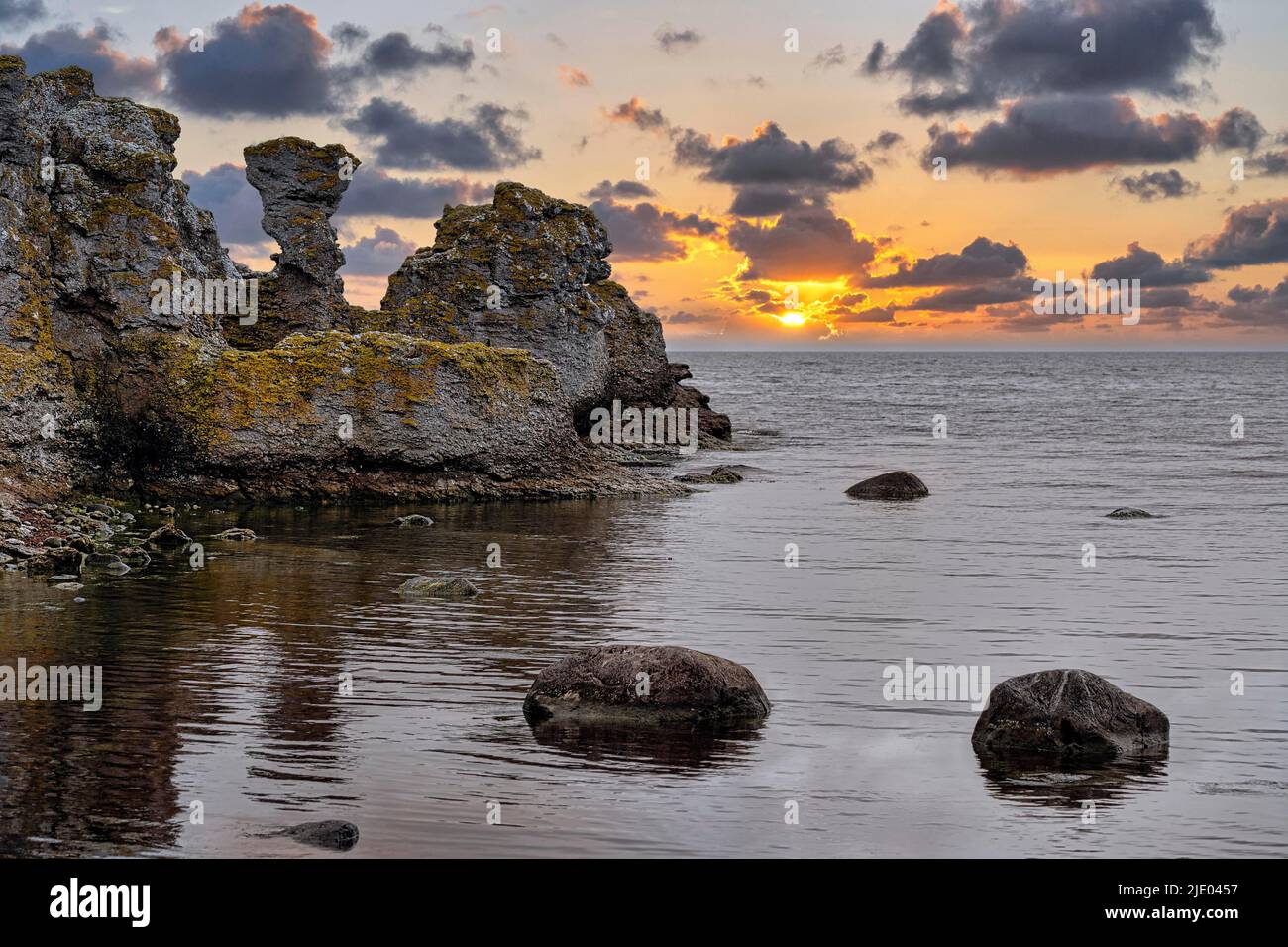 Rocky coast by the sea, Raukar on the east coast of Gotland, sunset ...