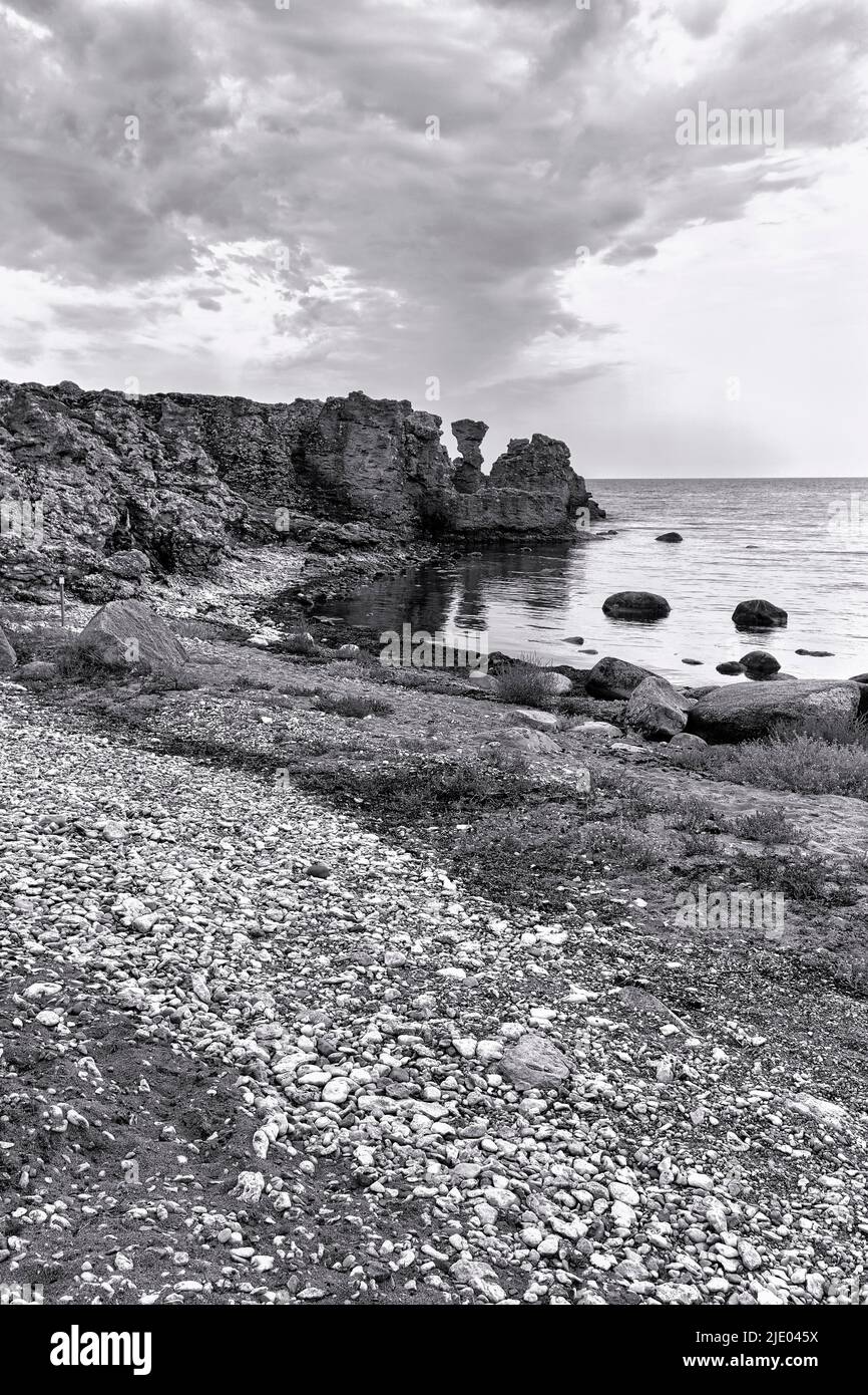 Rocky coast by the sea, Raukar on the east coast of Gotland, black and ...