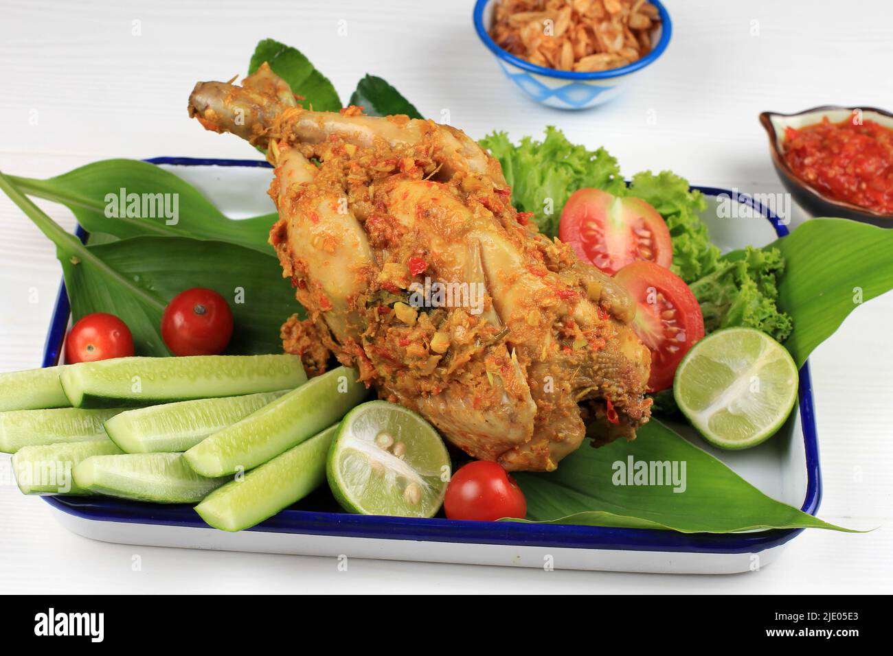 Ayam Betutu. Spicy Balinese Roast Chicken Stuffed with Cassava Leaves ...