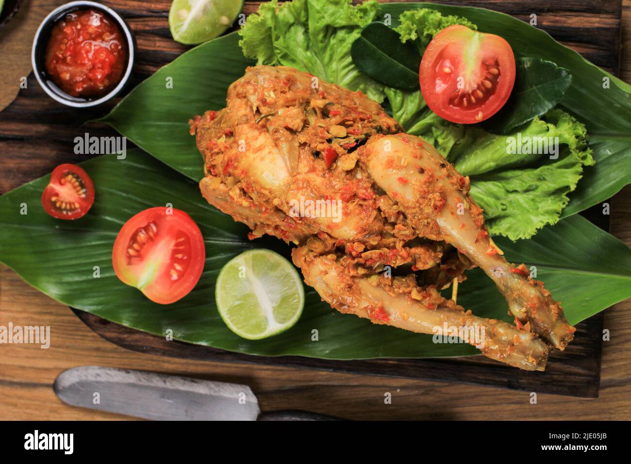 Ayam Betutu. Balinese Roast Chicken Stuffed with Cassava Leaves Stock ...
