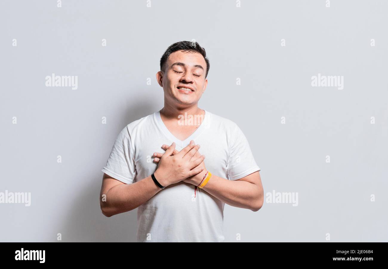 Attractive friendly and positive looking young man with a charming ...