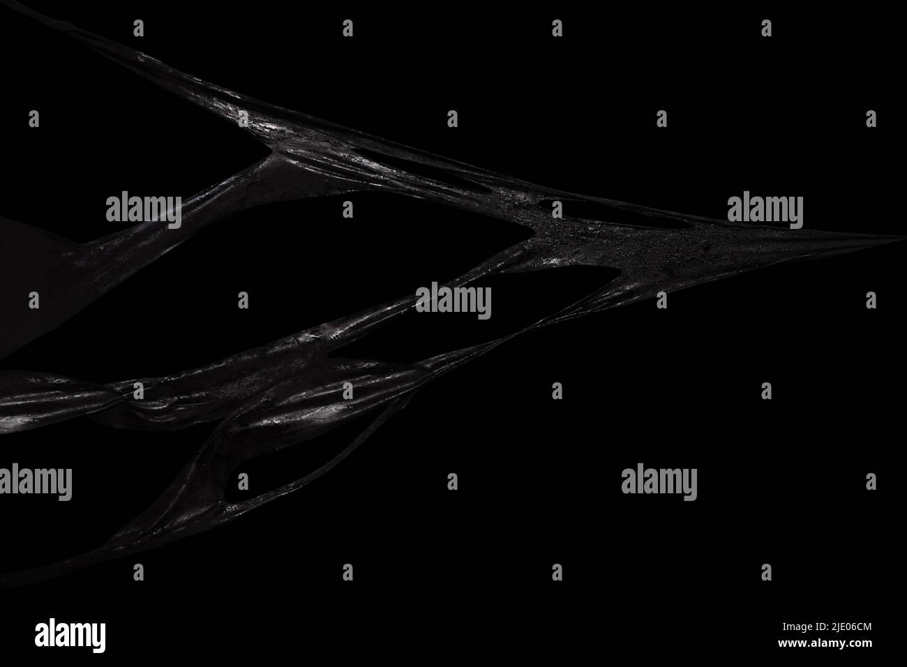 Black symbiote sismucus, sticky slime over dark background Stock Photo ...