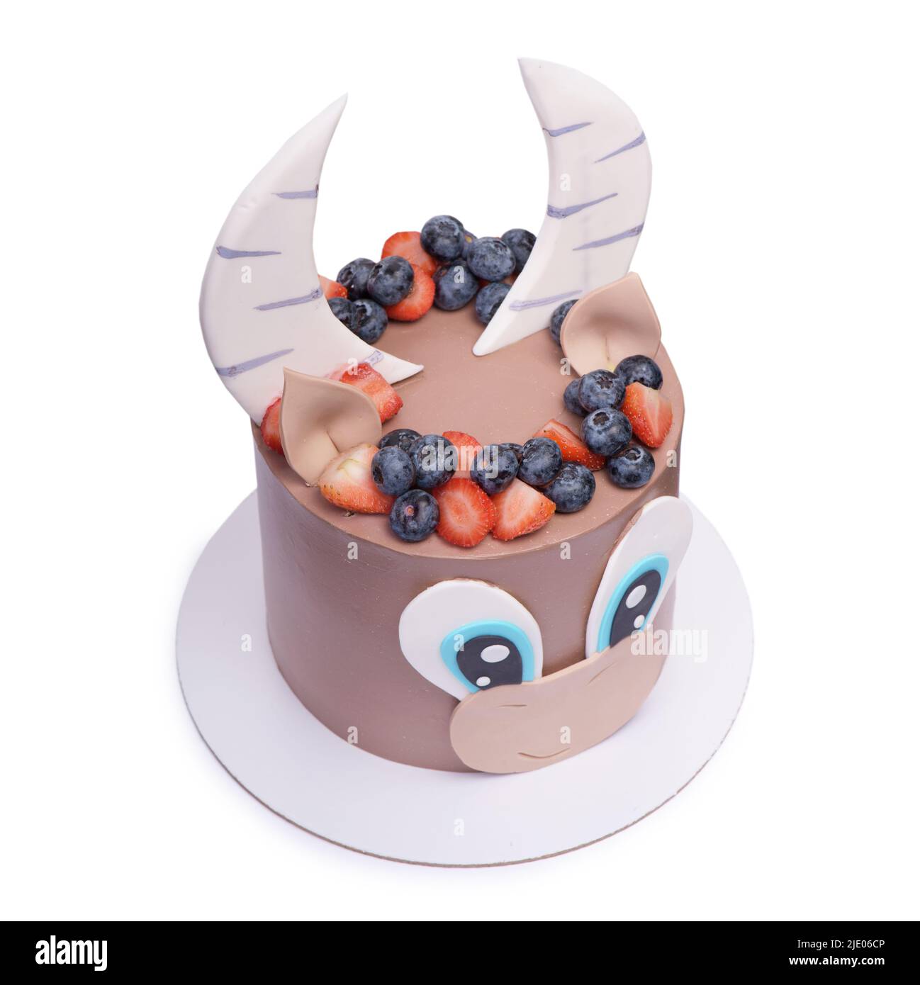 Bull head decorative cake isolated over white background Stock Photo ...