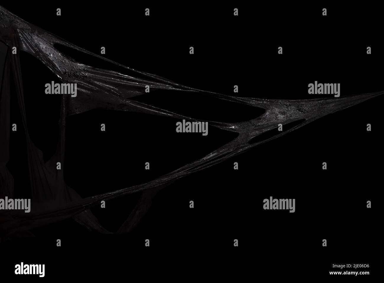 Black symbiote sismucus, sticky slime over dark background Stock Photo ...