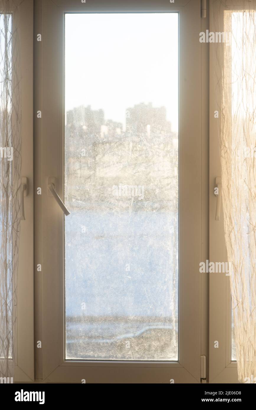 Window from the inside with a view of the sunny street Stock Photo - Alamy