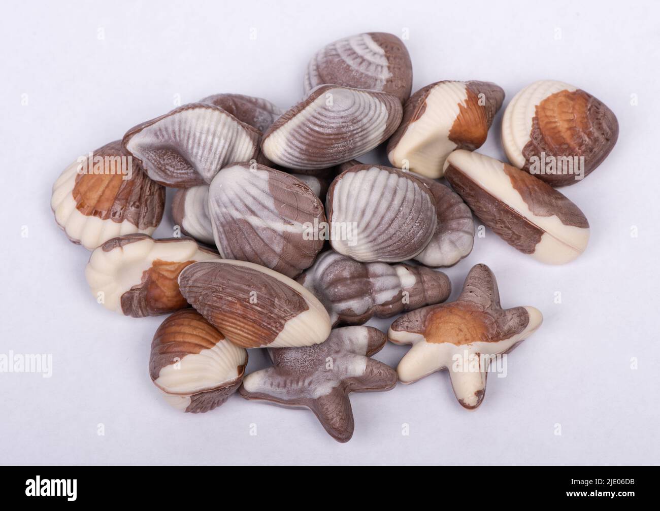 Group of seashell chocolate bar on white background Stock Photo - Alamy