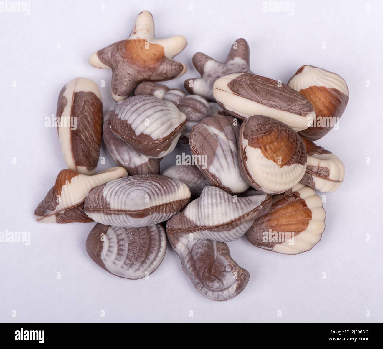 Group of seashell chocolate bar on white background Stock Photo - Alamy