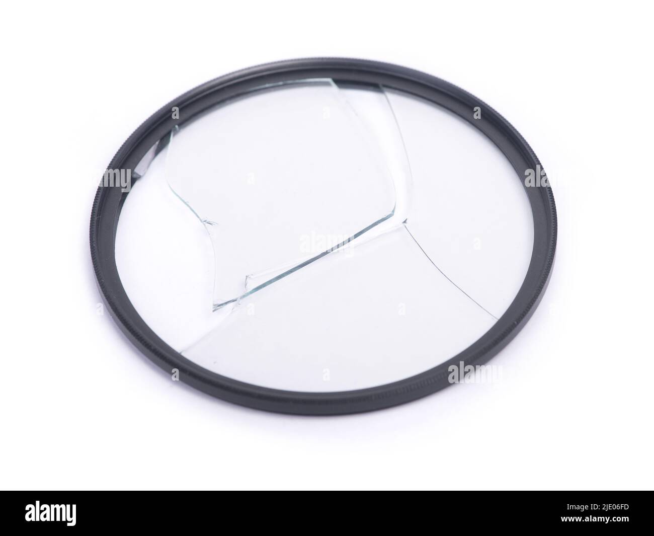 Broken camera lens filter isolated on white background Stock Photo - Alamy