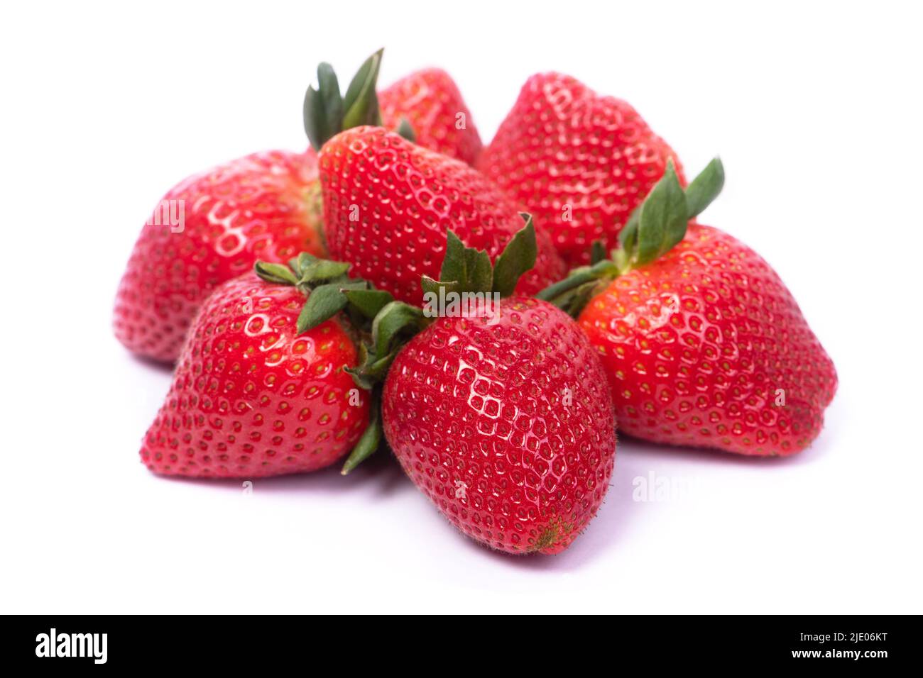 Group of natural strawberries from the garden isolated on white ...