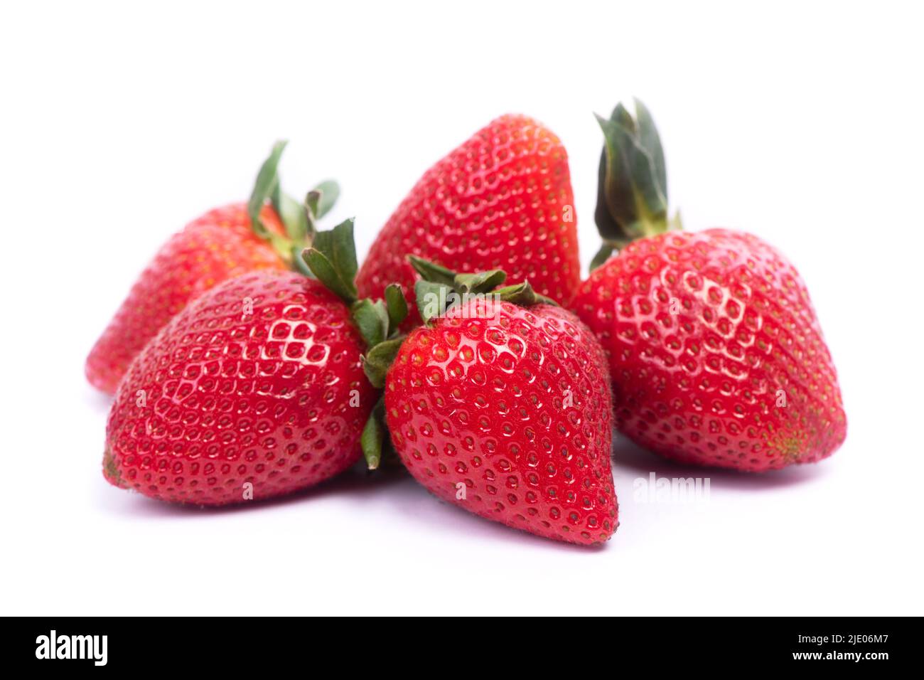 Group of natural strawberries from the garden isolated on white ...