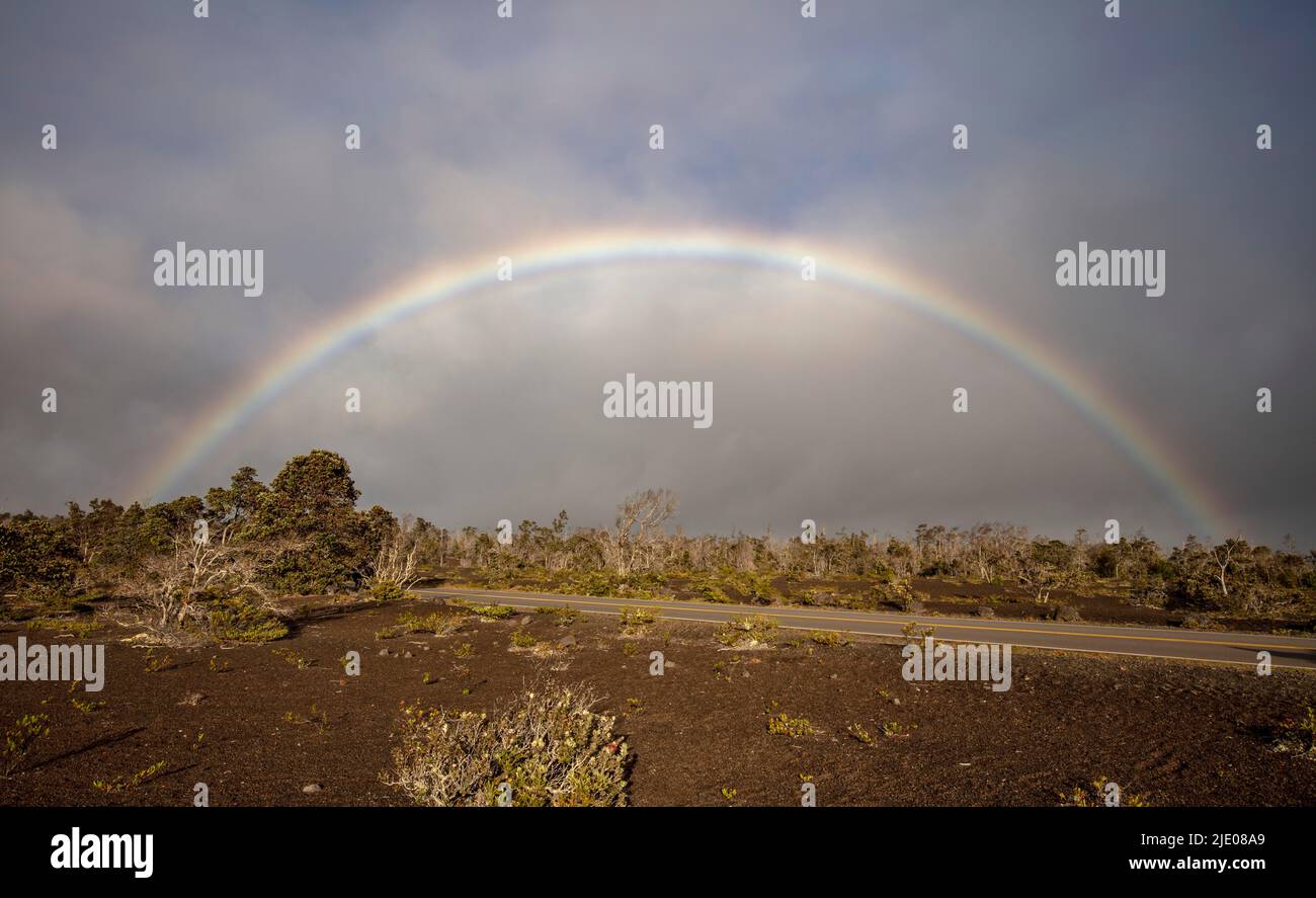 Rainbow over lava field and old road, Keanakako'i Crater, Crater Rim ...