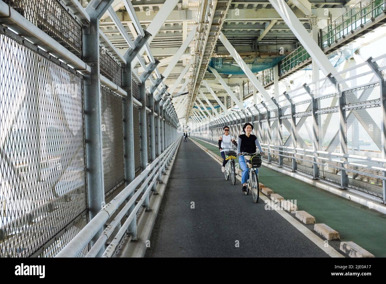 Cyclists riding across the multi-level Innoshima Bridge on the ...