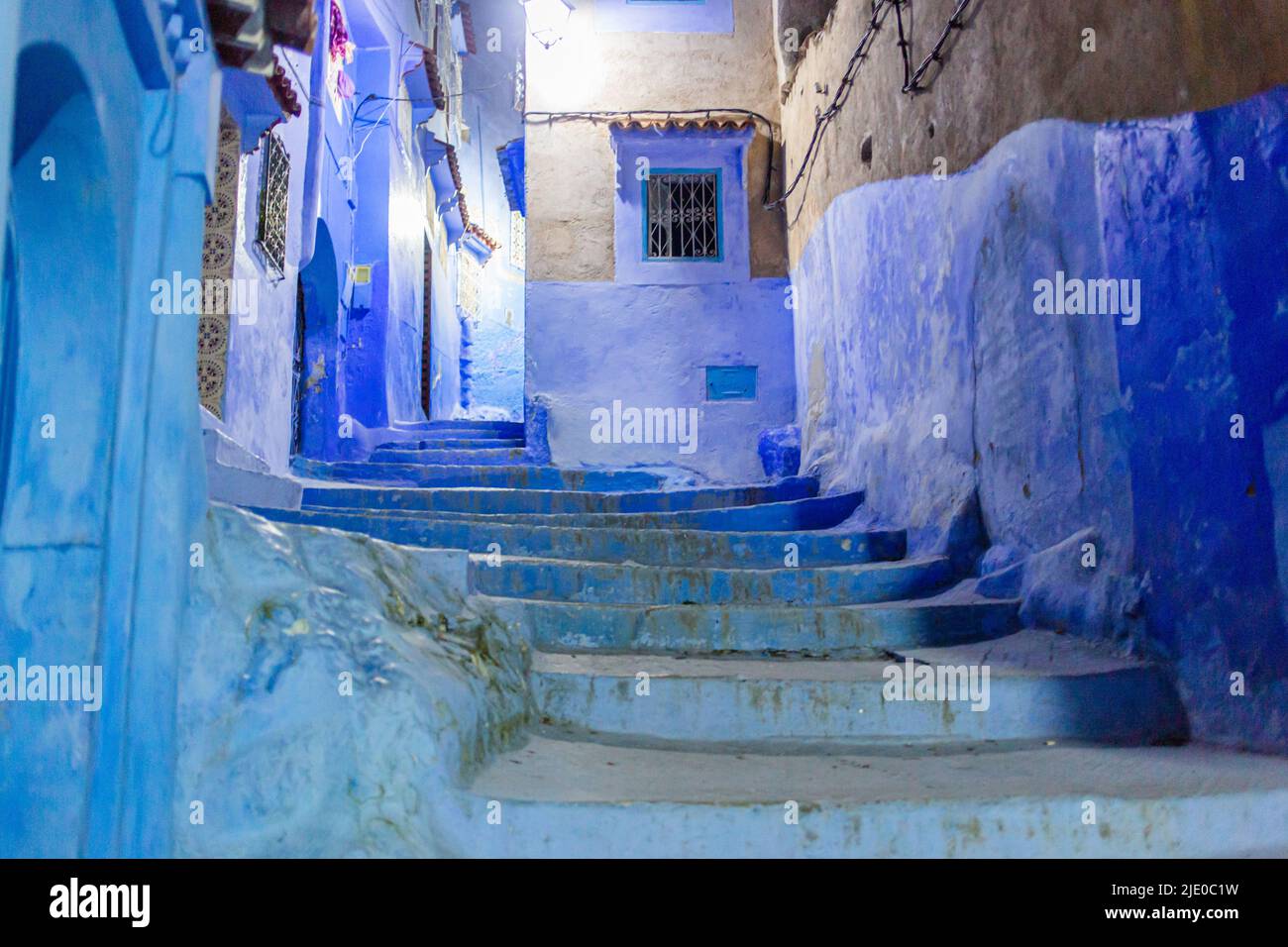 Stairs in the alleys of Chefchaouen by night Stock Photo - Alamy