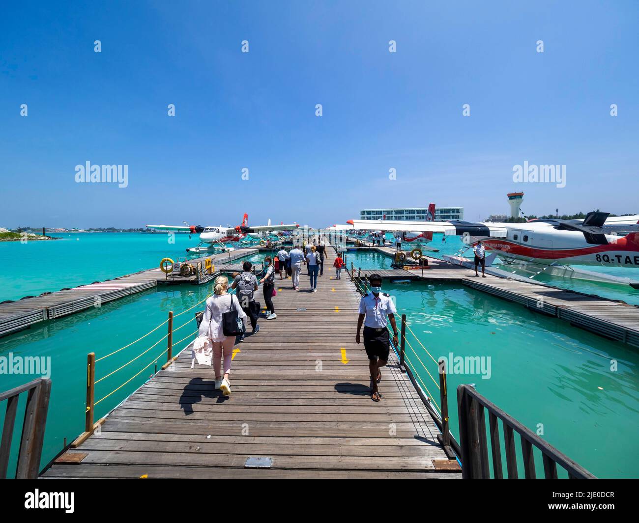Tourists board pontoon with seaplanes, De Havilland Canada DHC-6 300 ...