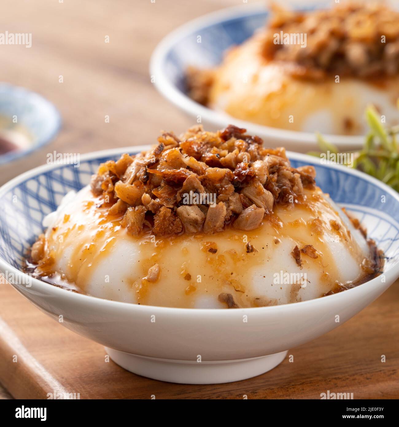 Taiwanese savory rice pudding Wa gui, rice cake with chopped dried ...