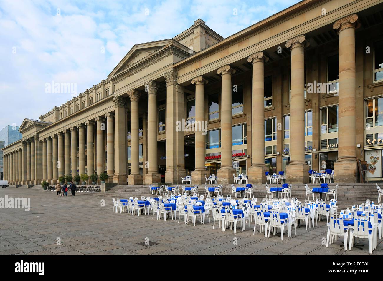 Tables and chairs of a street cafe in front of the Koenigsbau on ...