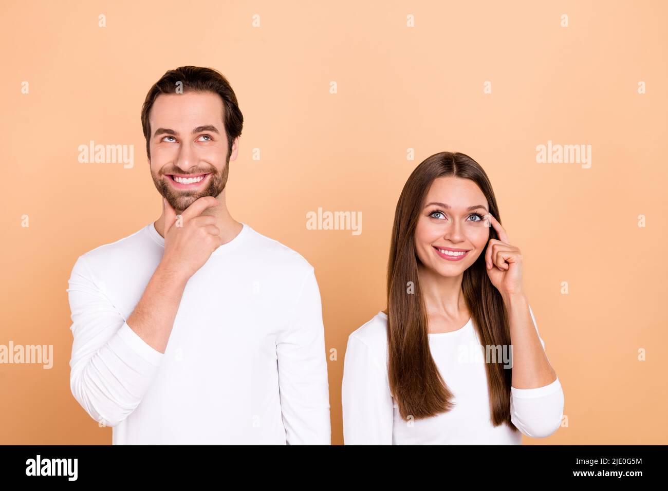 Portrait of attractive cheerful bewildered brown-haired people making ...