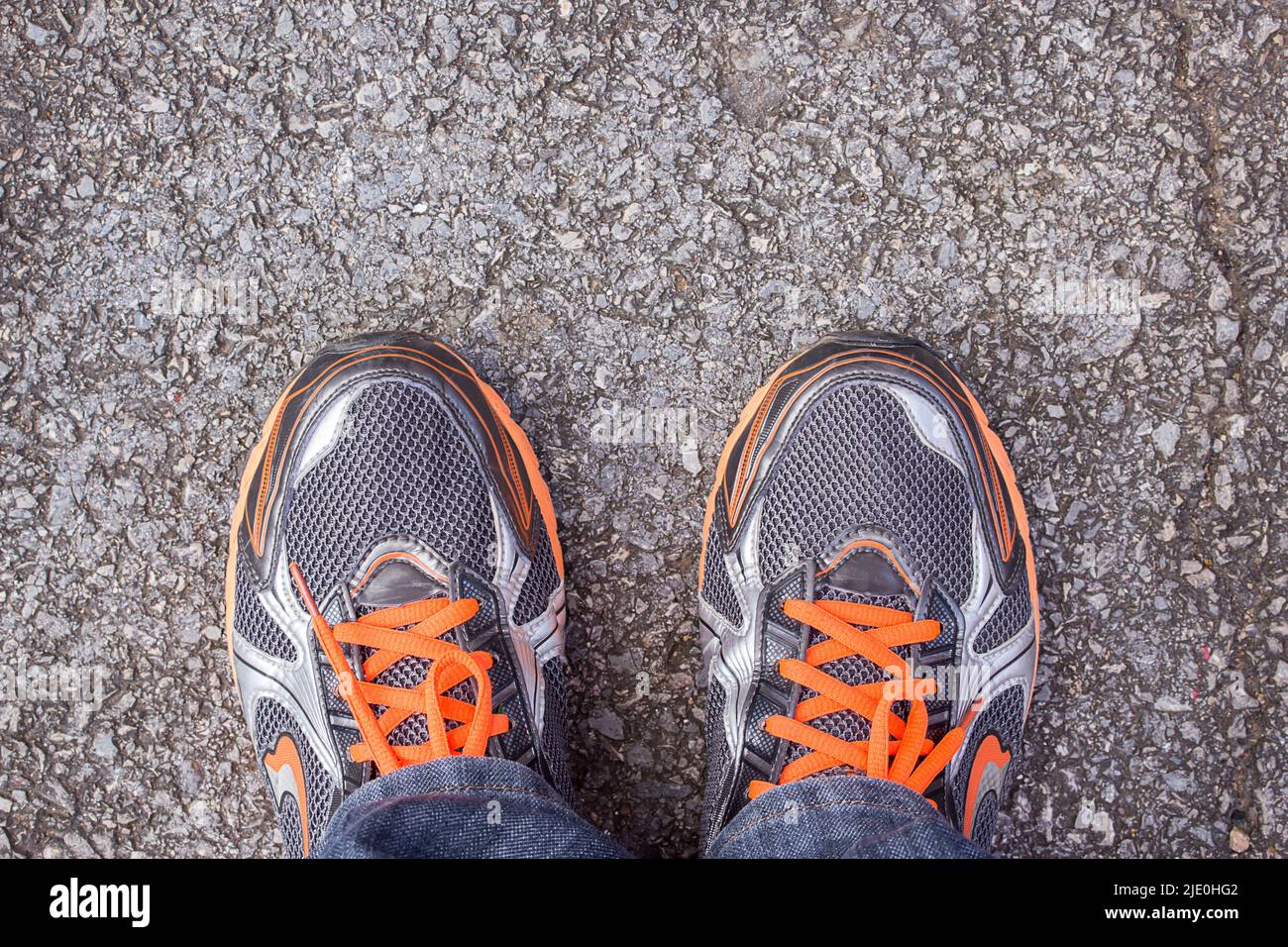 Top view of men's running shoes on a street Stock Photo - Alamy