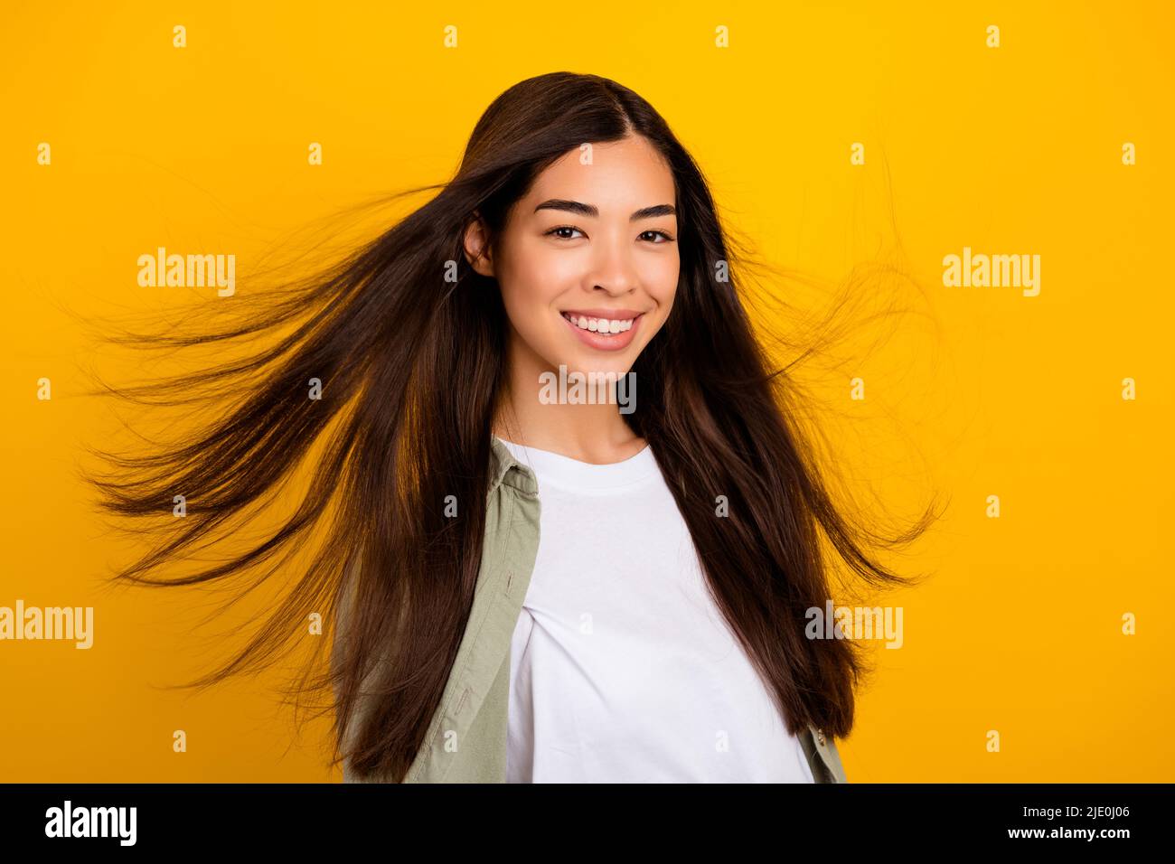 Photo of cheerful gorgeous person toothy beaming smile flying hairdo ...